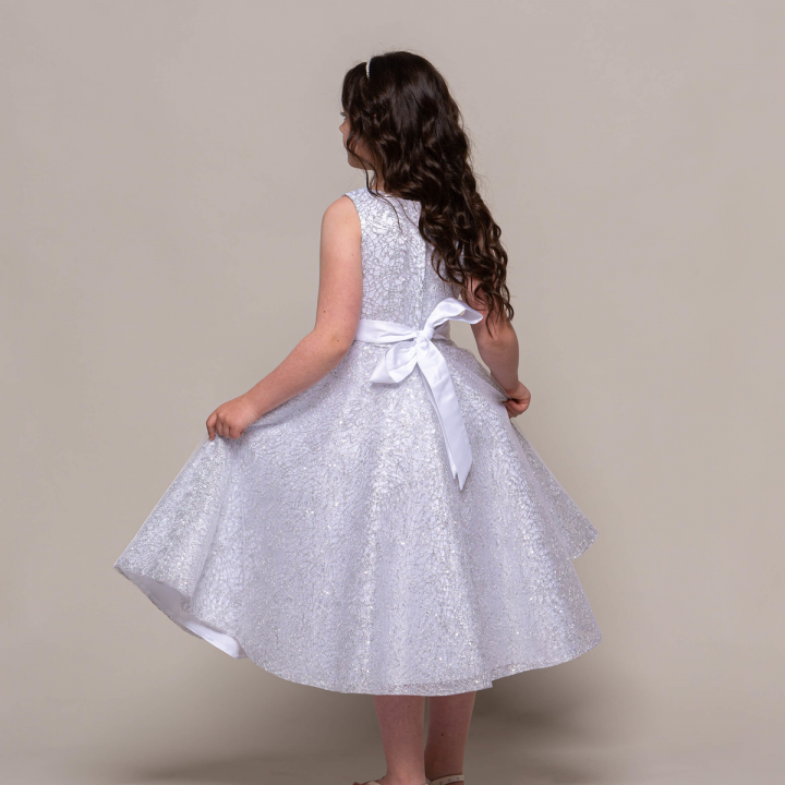 Glittery silver flower girl dress & ribbon | Elite Bridal